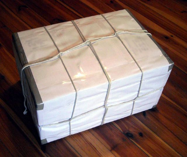 Parcel laced with string